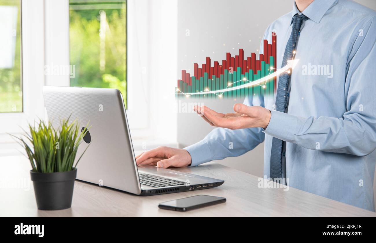Businessman hold drawing on screen growing graph, arrow of positive ...