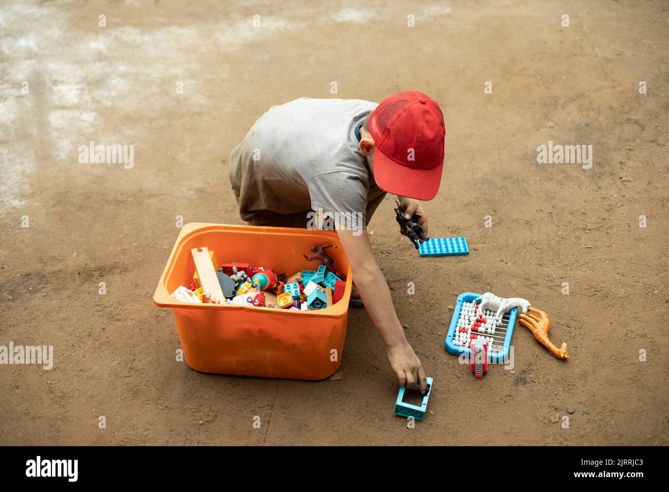 Boy cleans up his room hi-res stock photography and images - Alamy