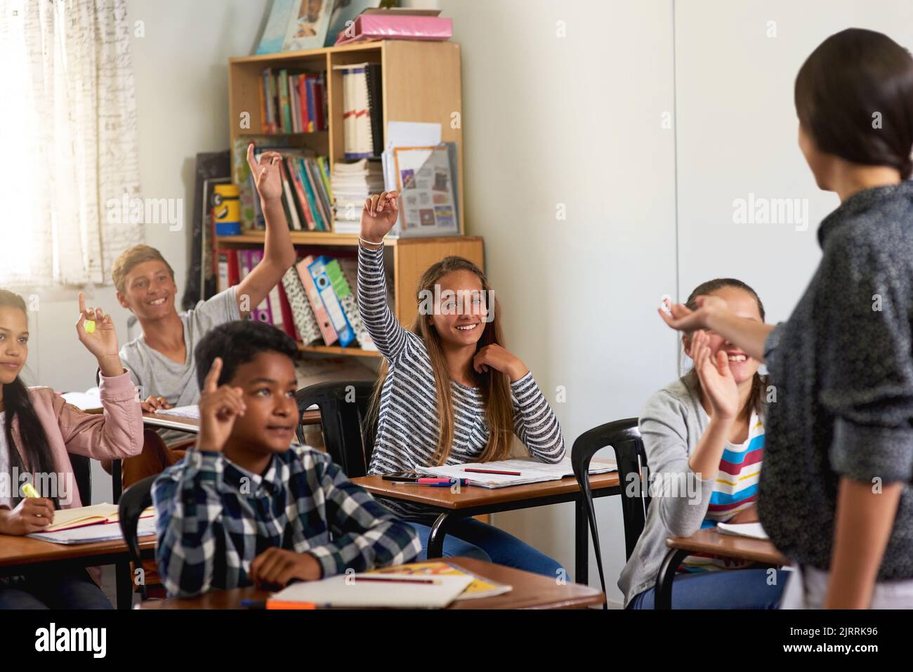 Students eager to answer question hi-res stock photography and images ...