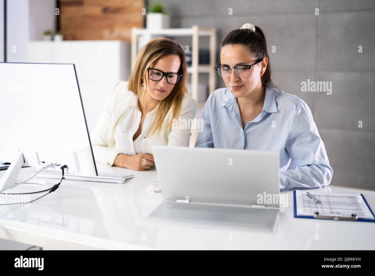 Hybrid Laptop At Workplace In Office. Training On Computer Stock Photo ...