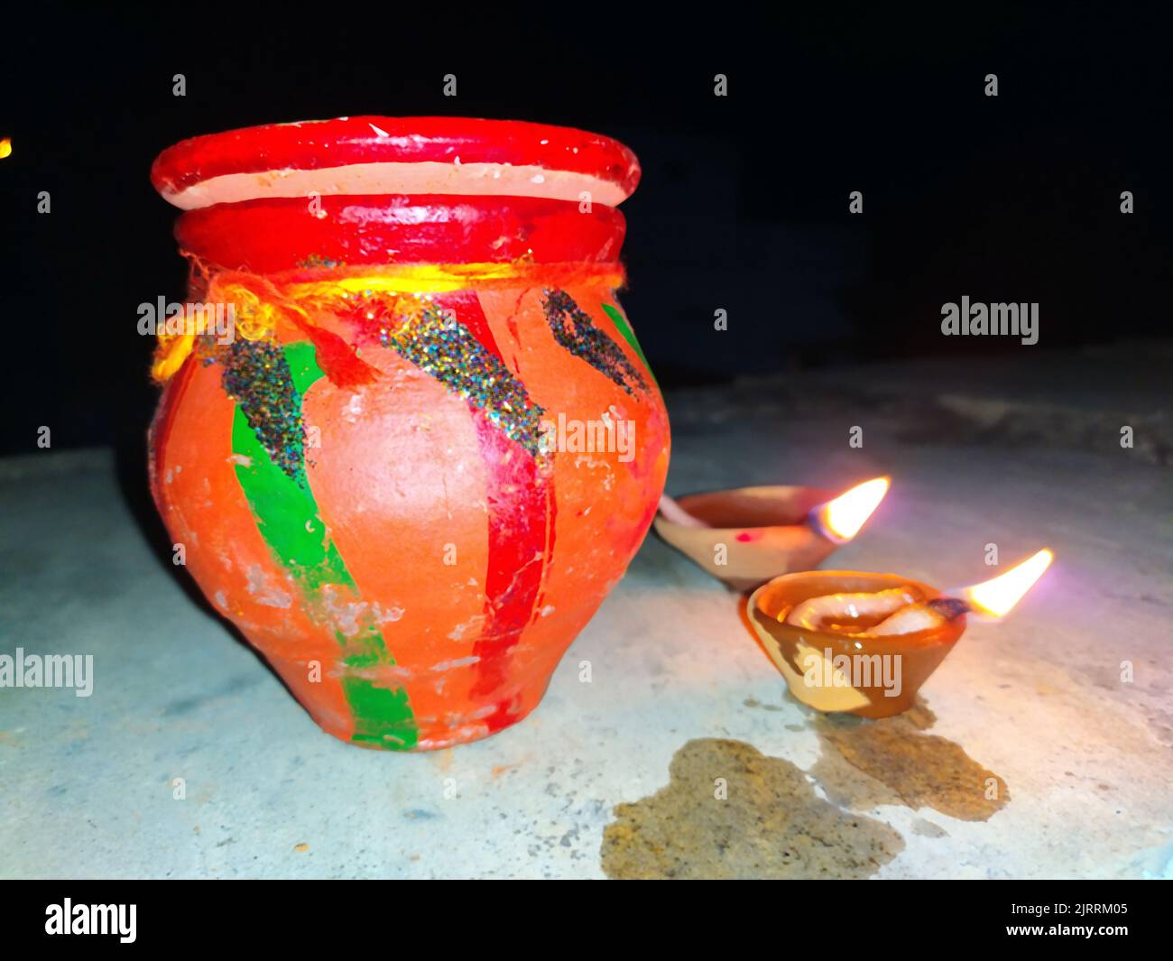 Traditional clay diya lamps lit during diwali celebration Stock Photo ...