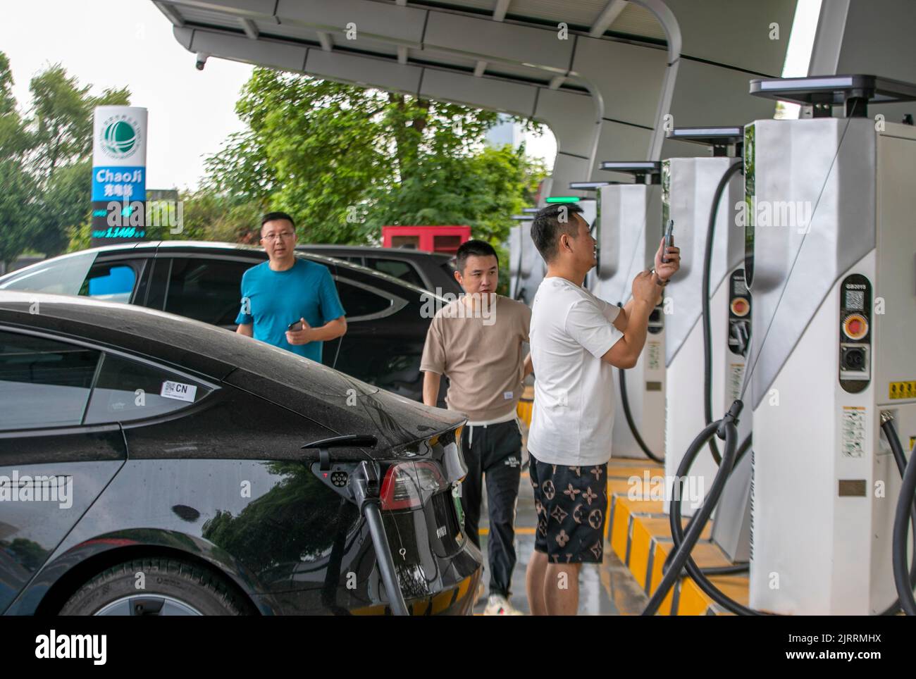 TAIZHOU, CHINA - AUGUST 26, 2022 - Car owners scan the code for ...