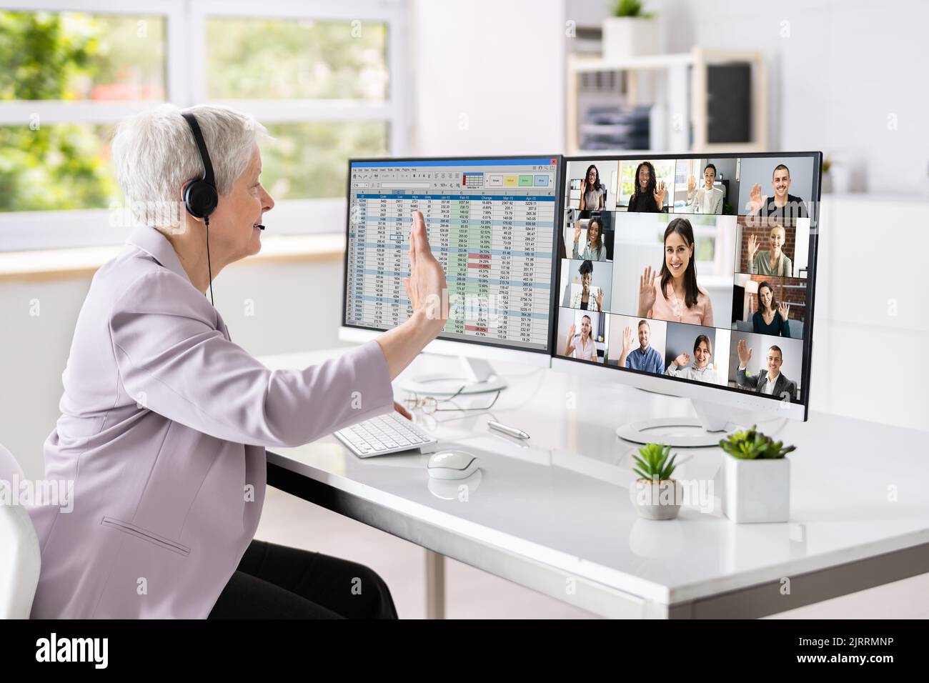 Businesswomen having video conference office hi-res stock photography ...