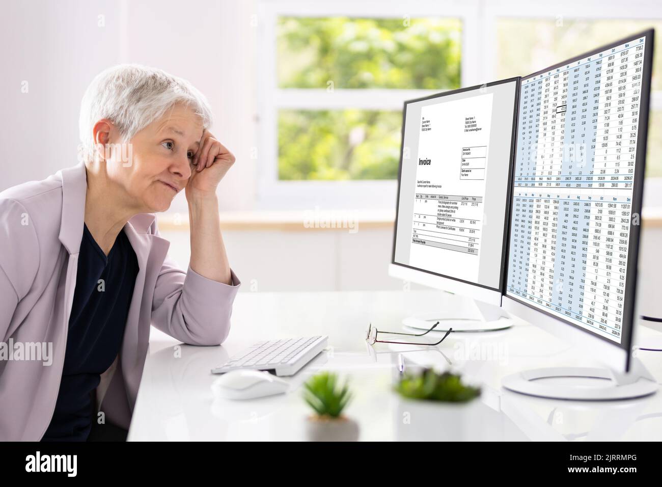 Bored Frustrated Workaholic Female Employee At Desk Stock Photo - Alamy