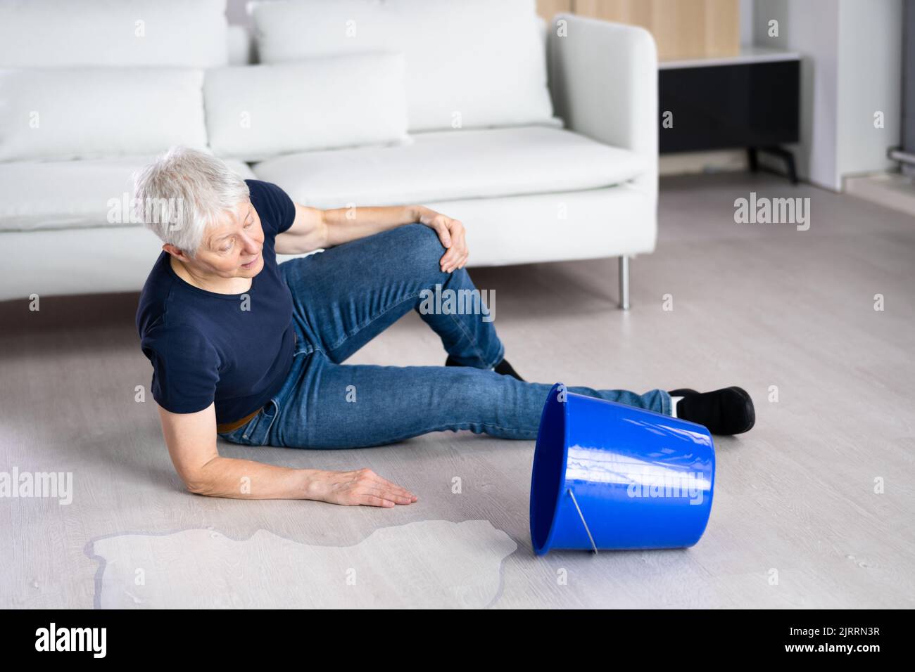 Slip And Fall Accident. Wet Floor Water Spill Stock Photo - Alamy