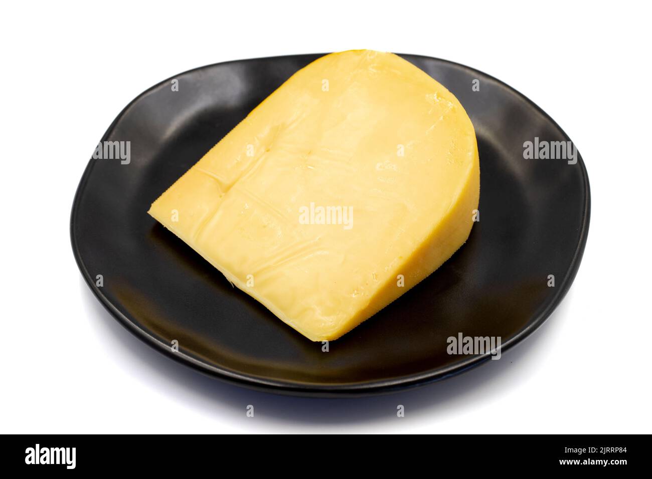 Yellow gouda cheese. Hard Dutch gouda cheese, isolated on white ...