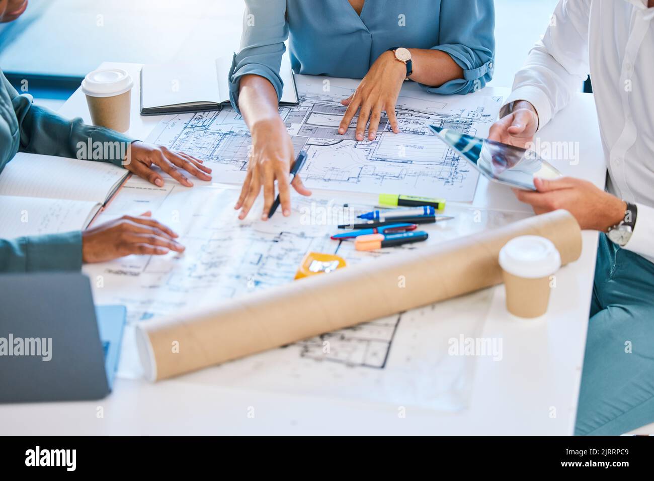 Architect blueprints, engineers and designers analyzing drawing, draft ...