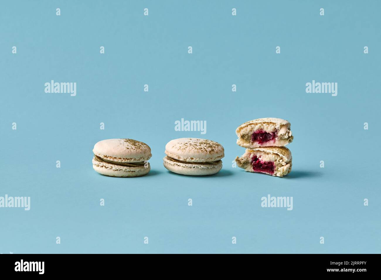 White macarons cake with colorful powder, top view, flat lay, sweet ...