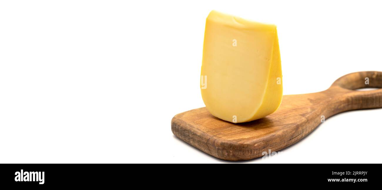 Yellow gouda cheese. Hard Dutch gouda cheese, isolated on white ...