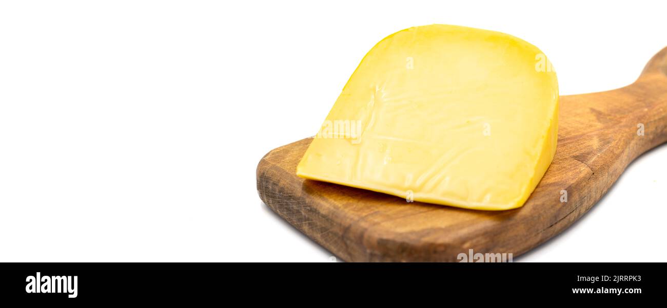 Yellow gouda cheese. Hard Dutch gouda cheese, isolated on white ...