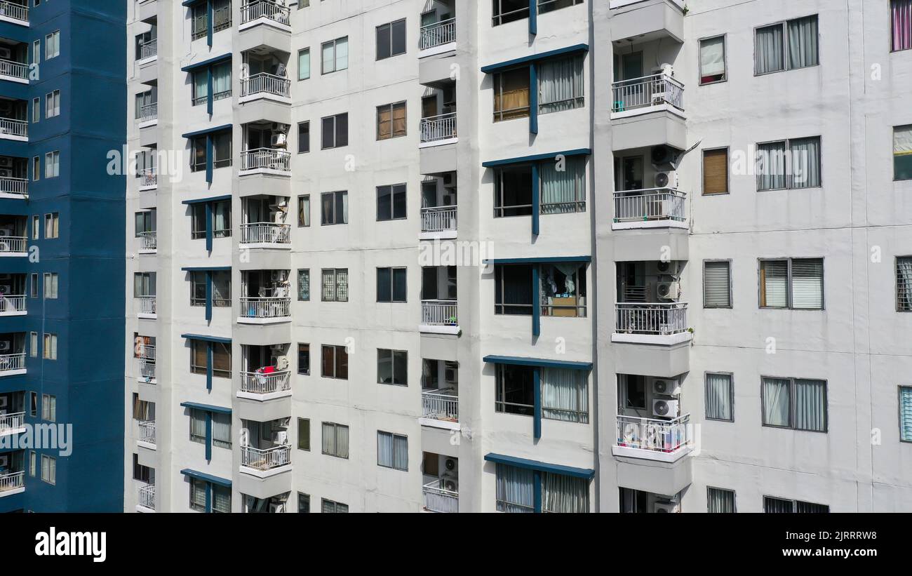 Exterior of a modern high-rise multi-story apartment building condo ...