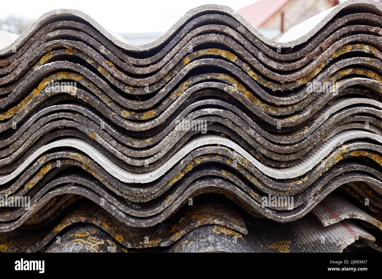 A stack of wave slate. Gray wavy slate. Slate Roofing. Home ...