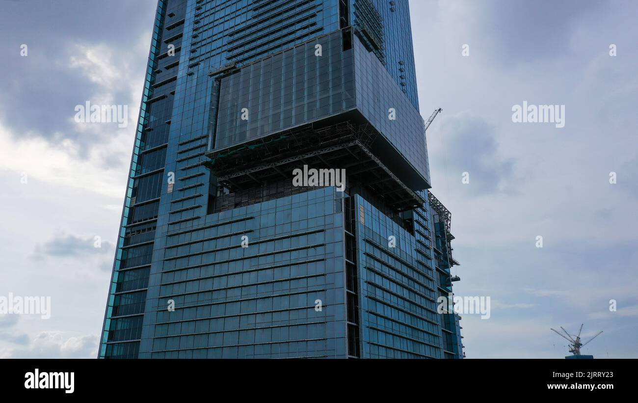 Aerial Close up Construction of high-rise skyscrapers with many floors ...