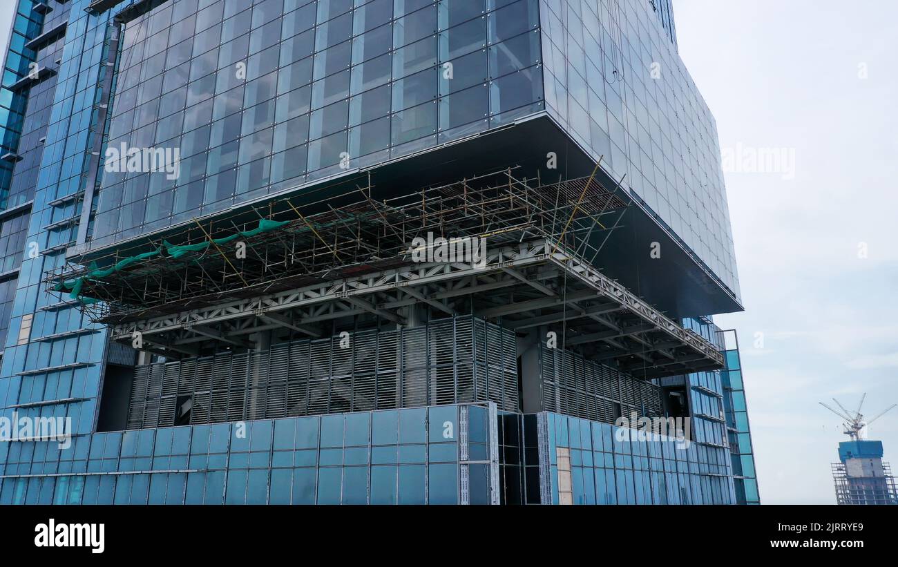 Aerial Close up Construction of high-rise skyscrapers with many floors ...