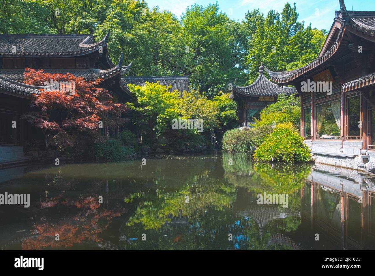 The traditional buildings near a pond in Hangzhou, China Stock Photo ...
