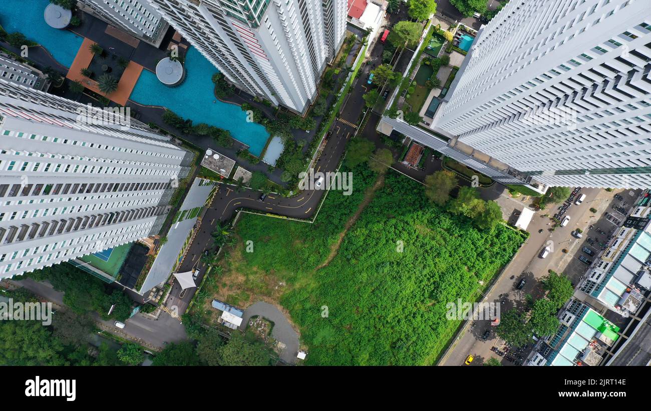 Top down view of residential apartment building in Jakarta. Birds eye ...