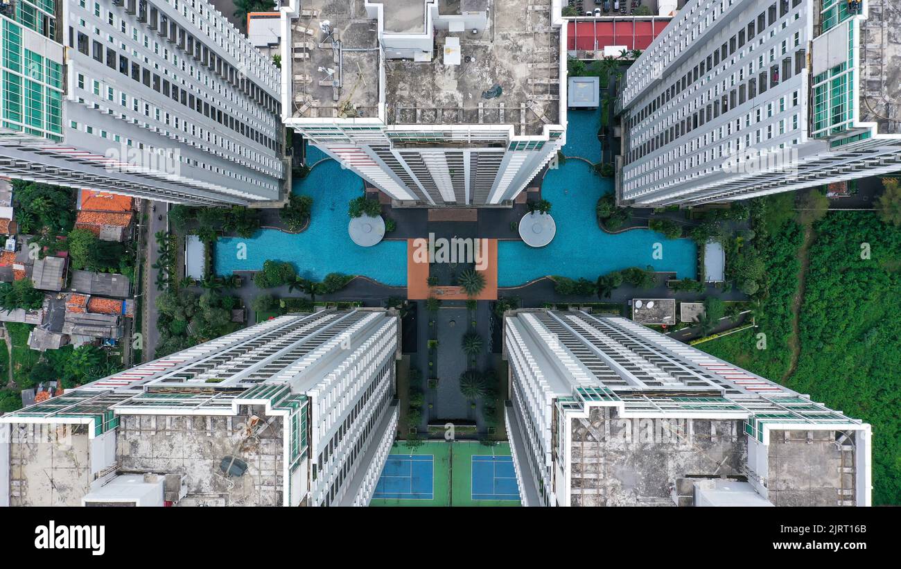 Top down view of residential apartment building in Jakarta. Birds eye ...