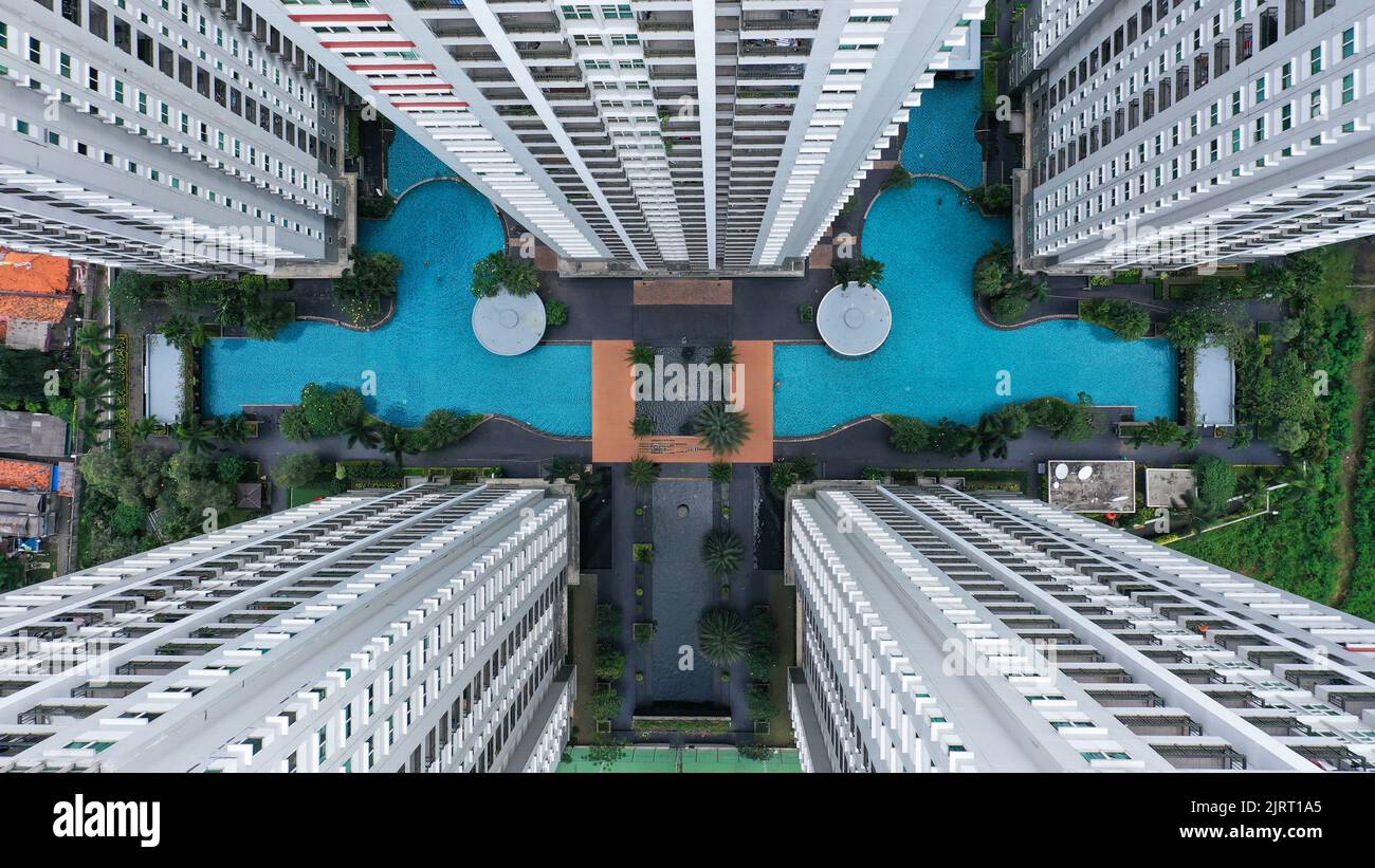 Top down view of residential apartment building in Jakarta. Birds eye ...