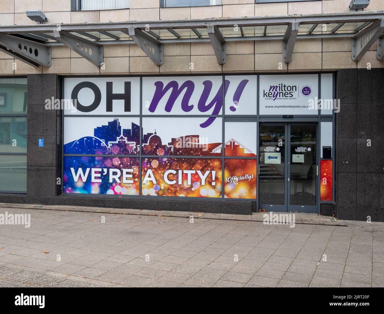 Shop front celebrating Milton Keynes being awarded city status 2022 as ...