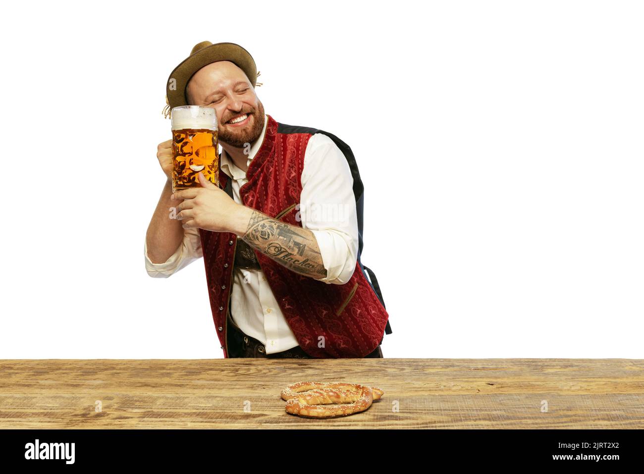 Portrait of young man wearing traditional Bavarian or German clothes ...