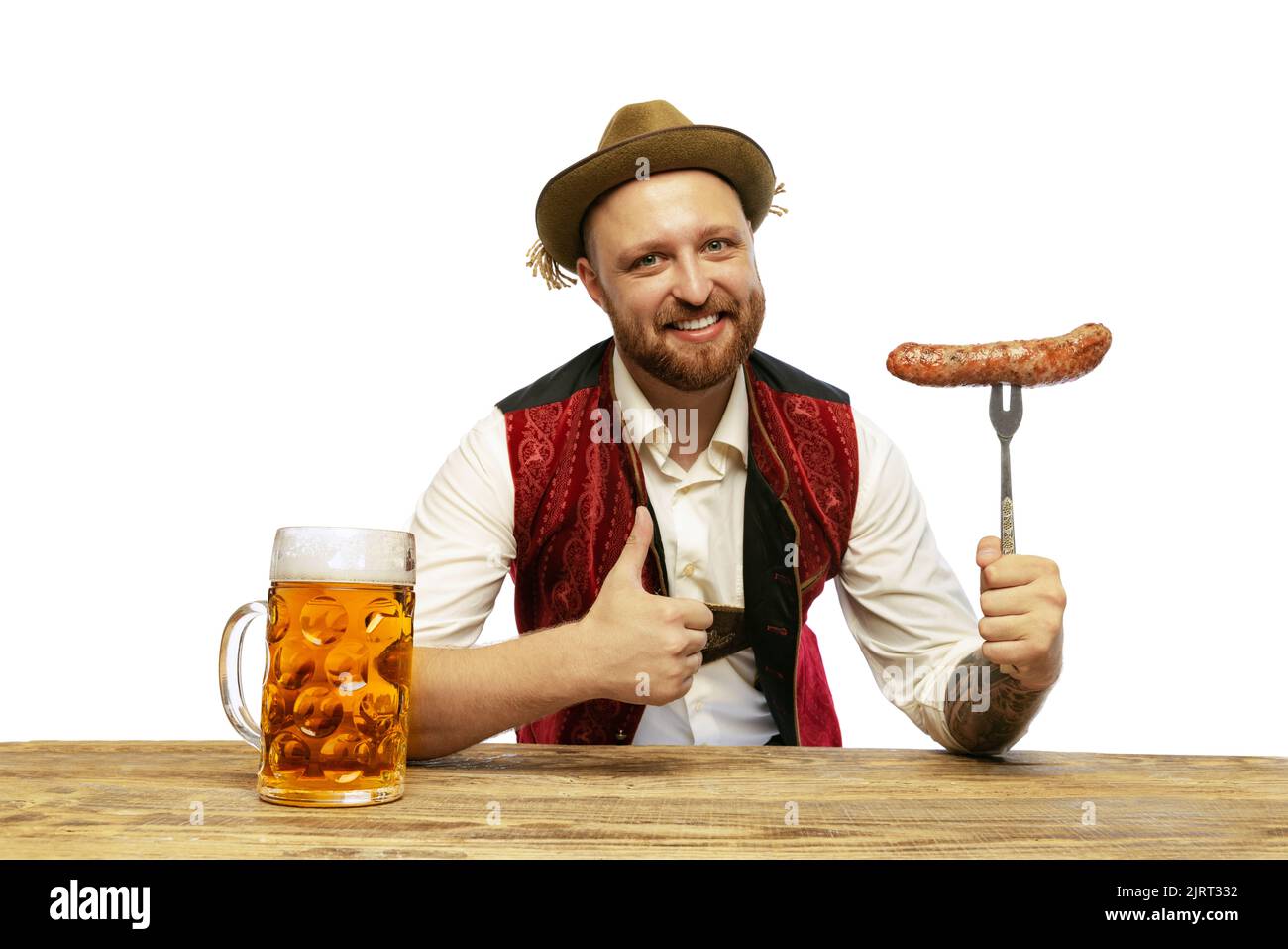 Portrait of young man wearing traditional Bavarian or German clothes ...