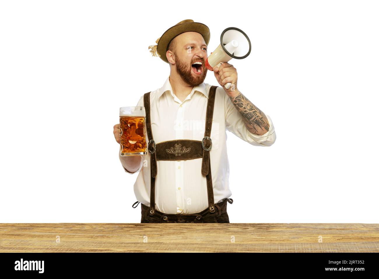 Portrait of young man wearing traditional Bavarian or German clothes ...