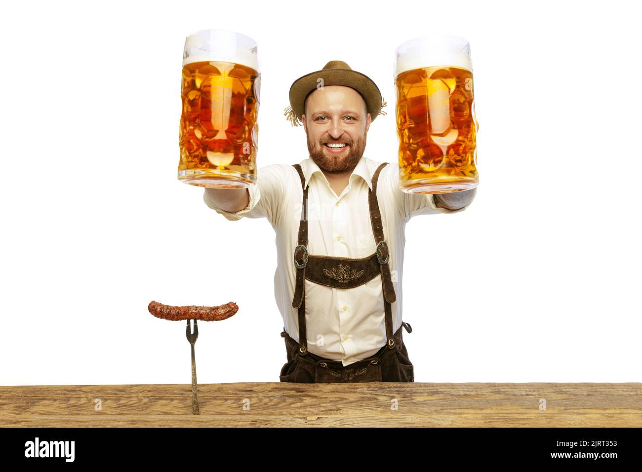 Portrait of smiling man wearing traditional Bavarian or German clothes ...