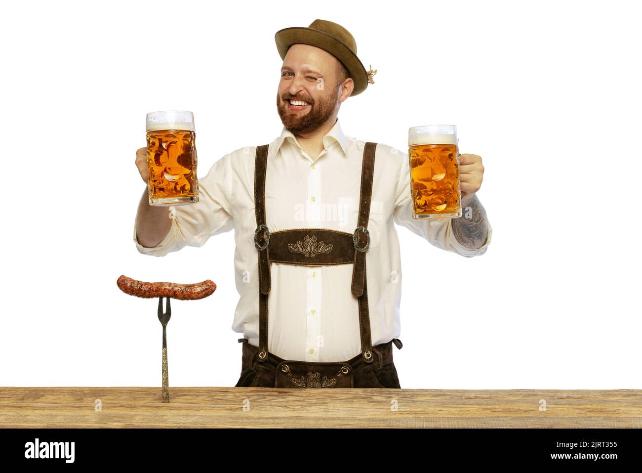 Portrait of young man wearing traditional Bavarian or German clothes ...