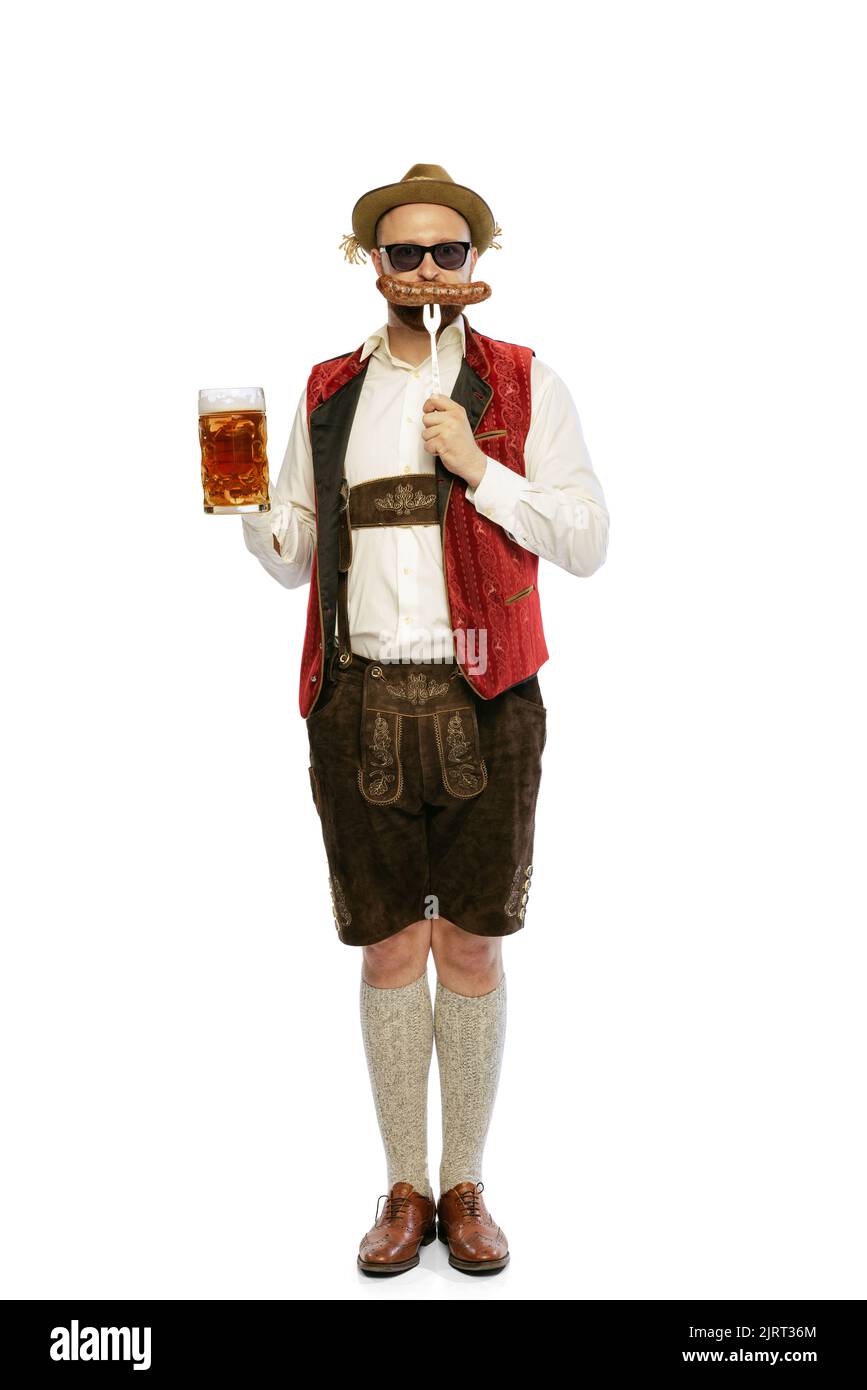 Portrait of young man wearing traditional Bavarian or German clothes ...