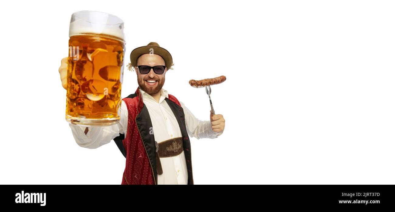 Portrait of young man wearing traditional Bavarian or German clothes ...