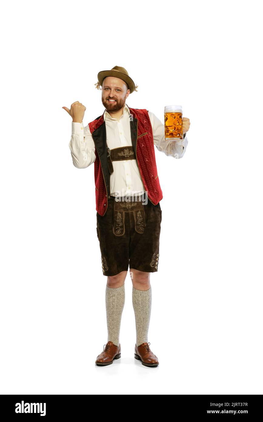 Portrait of young man wearing traditional Bavarian or German clothes ...