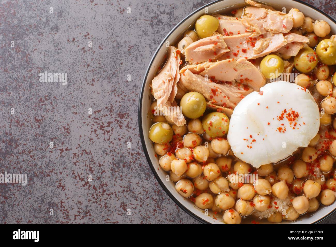Traditional Tunisian chickpea soup served for breakfast Lablabi with a ...