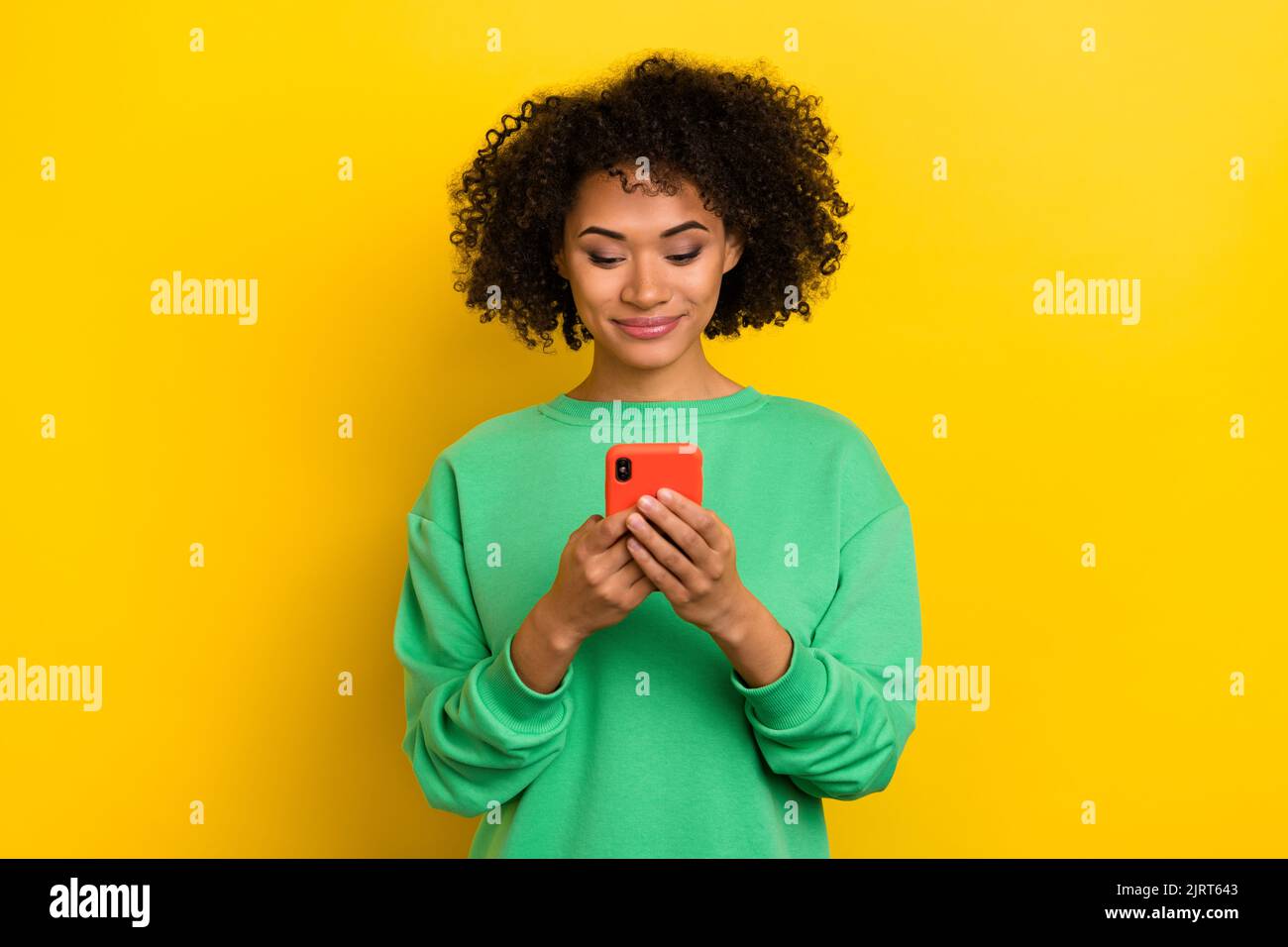 Photo of pretty sweet young lady dressed green sweater typing modern ...