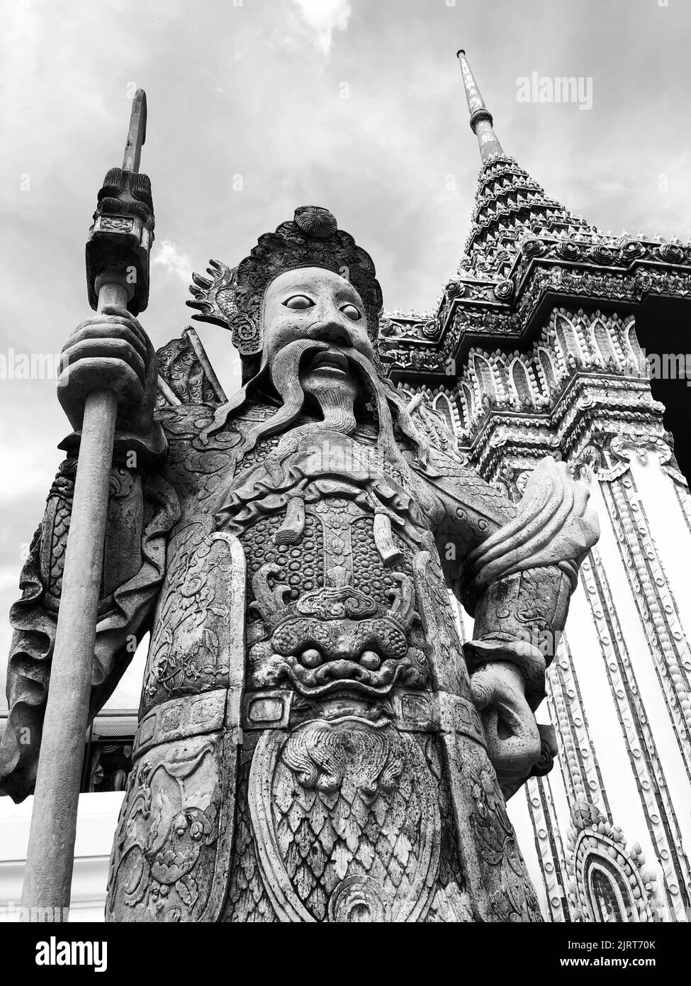 A greyscale shot of an ancient statue of a warrior in Thailand Stock ...