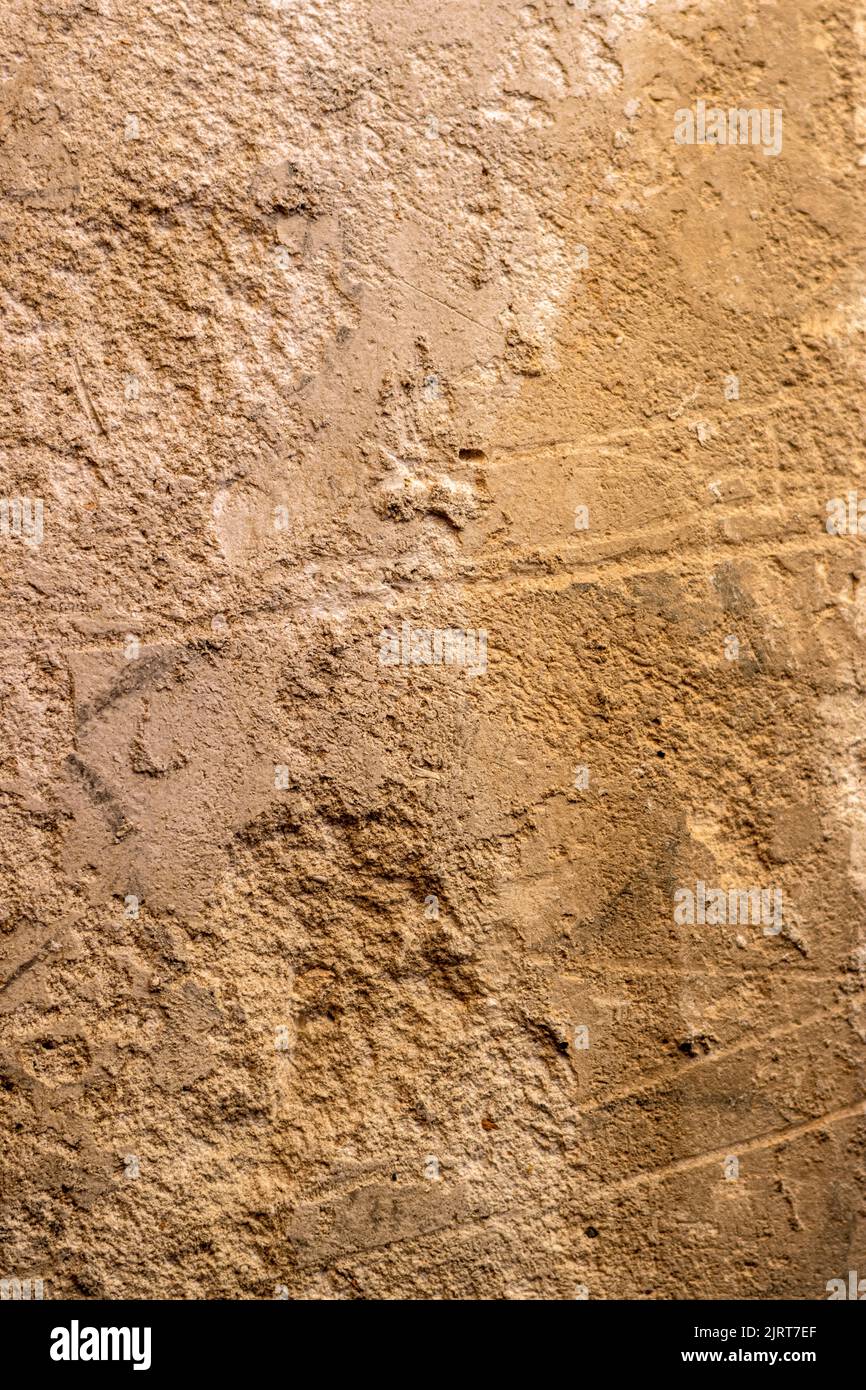 Vertical shot of a stone wall. Texture of natural stone worn by the ...