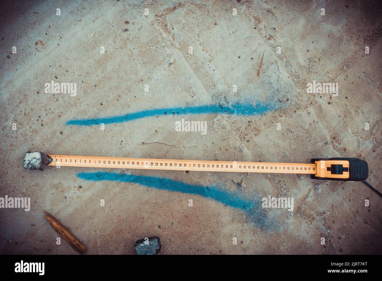 Measuring ruler on a concrete wall texture. The concept of renovation ...