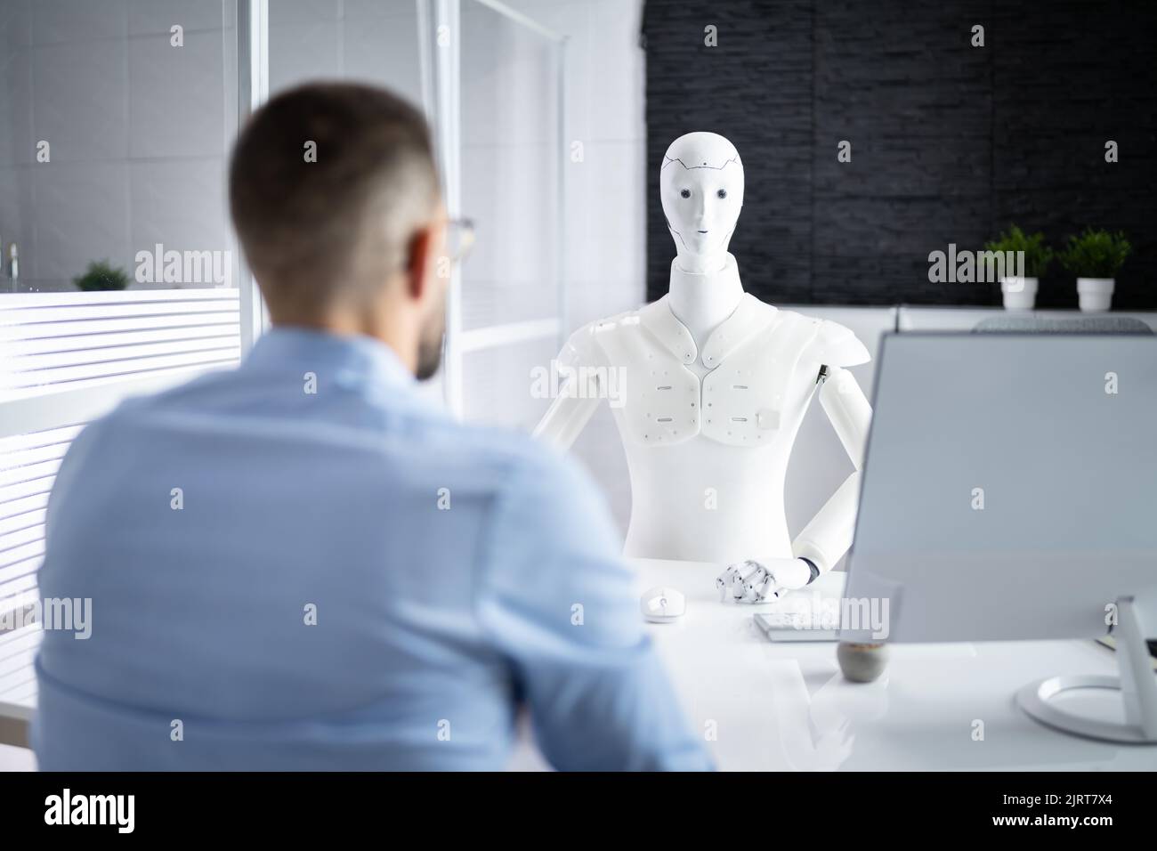 Businessman using robot ai hi-res stock photography and images - Alamy