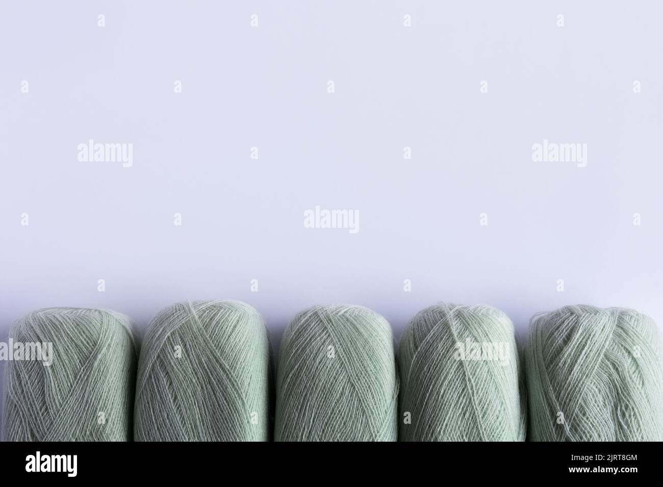 Green woolen threads hi-res stock photography and images - Alamy
