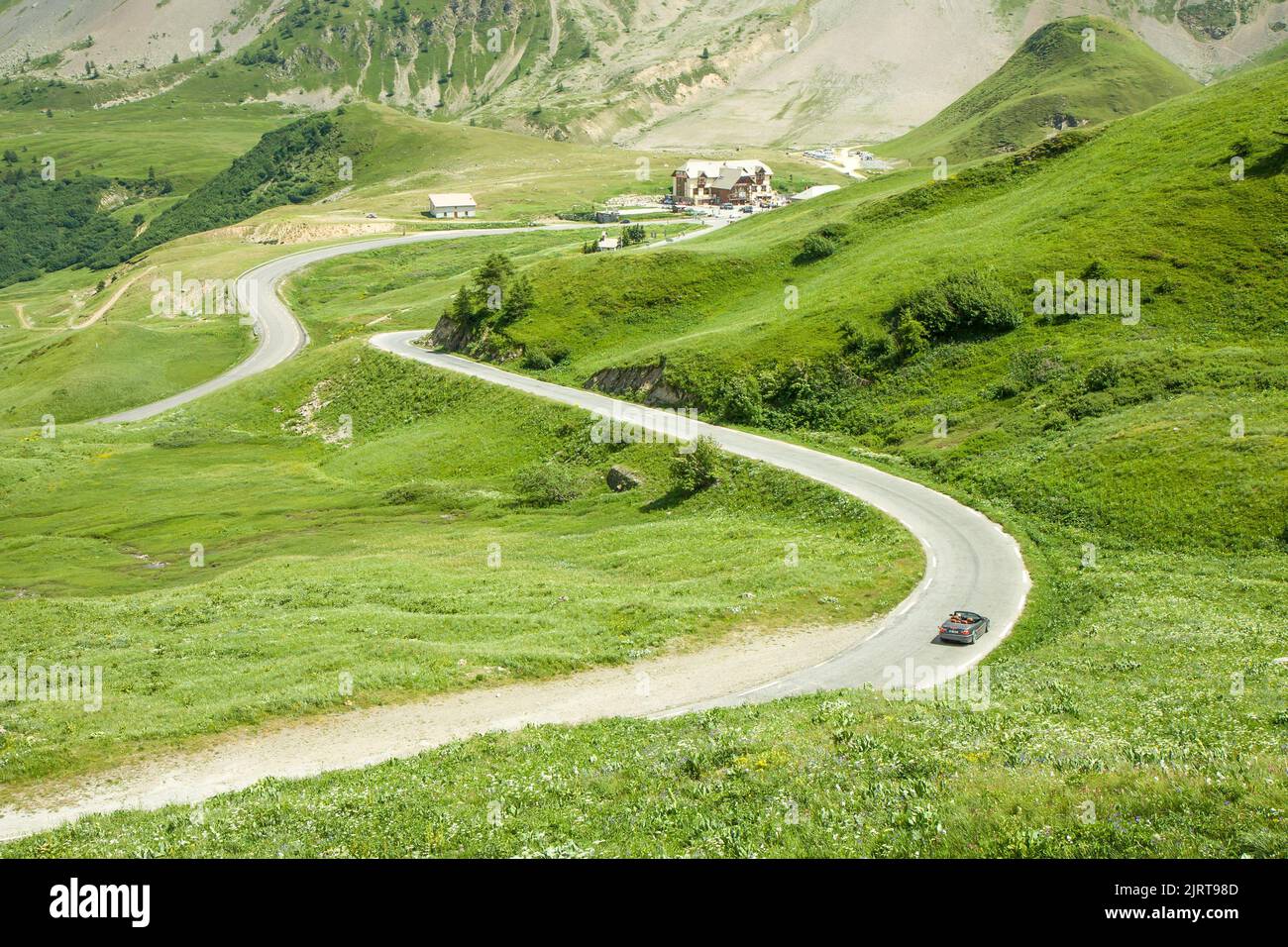 Col du Galibier France - pass with convertible car on the winding road ...