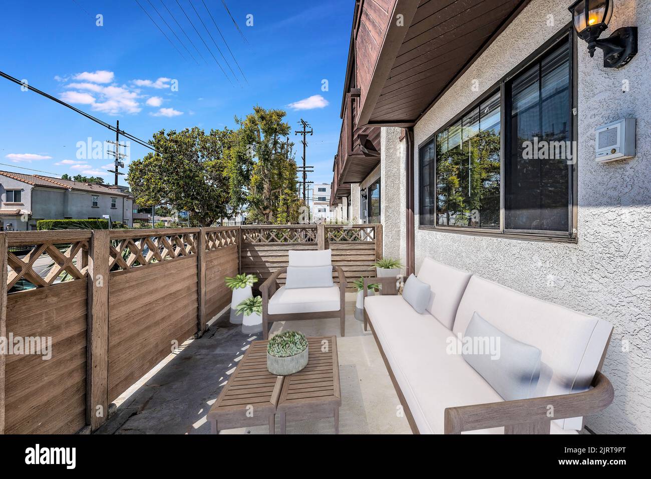 New luxury home with a fully fenced back yard with wooden couch, wooden ...