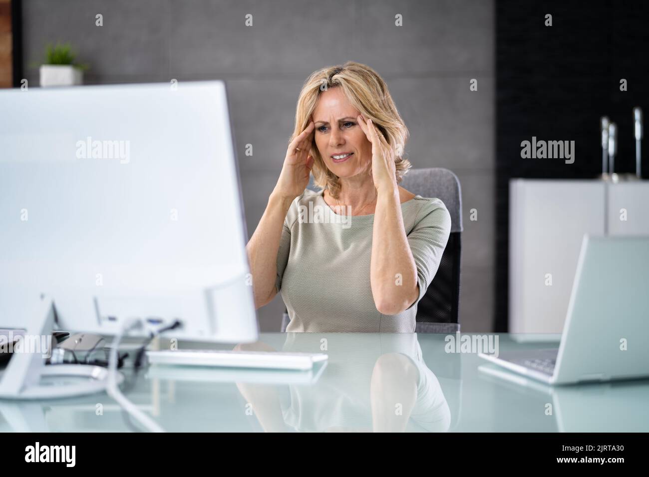Unhappy Sad Business Woman. Stress And Headache Using Computer Stock ...