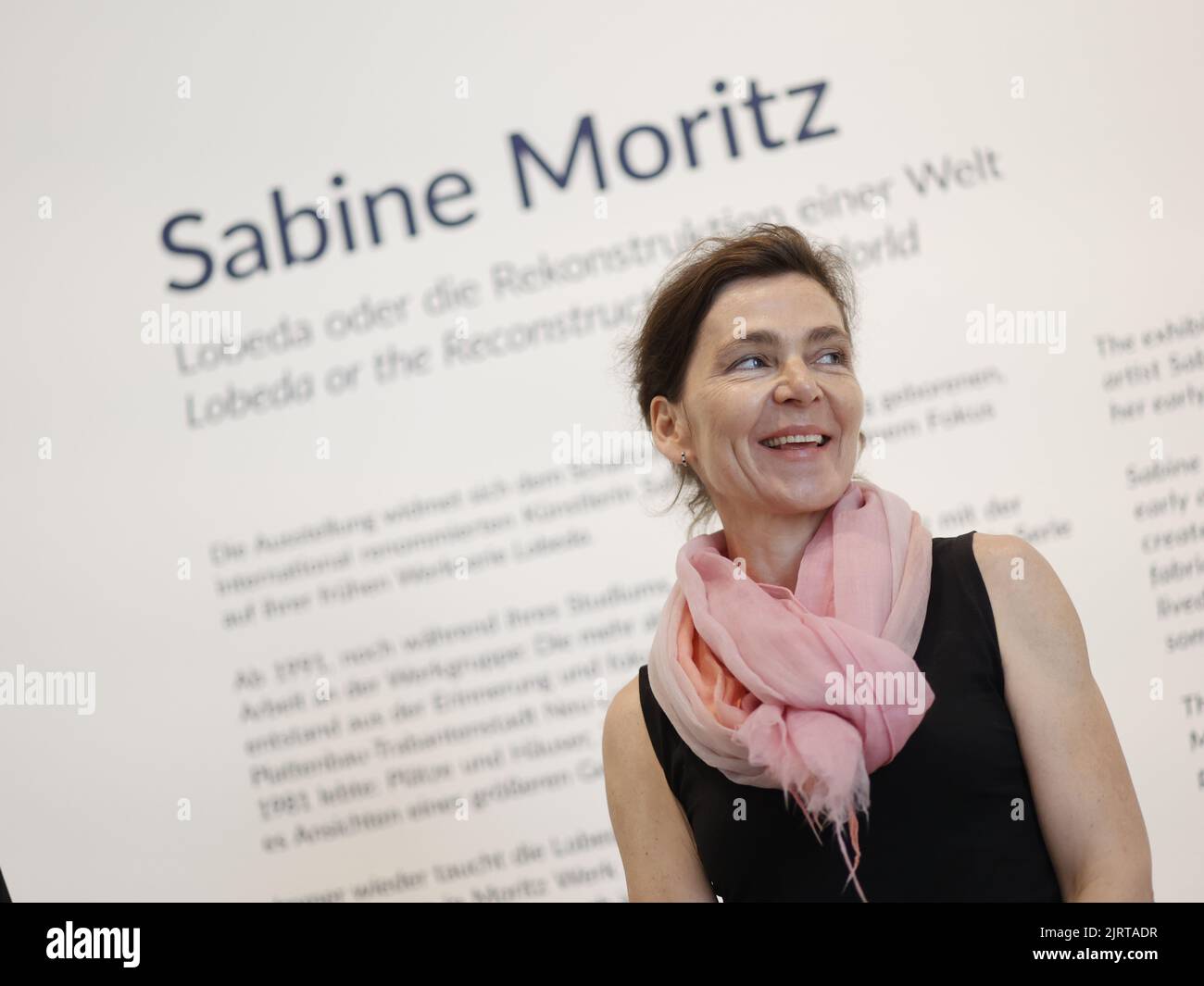 Quedlinburg, Germany. 26th Aug, 2022. Artist Sabine Moritz stands in an ...