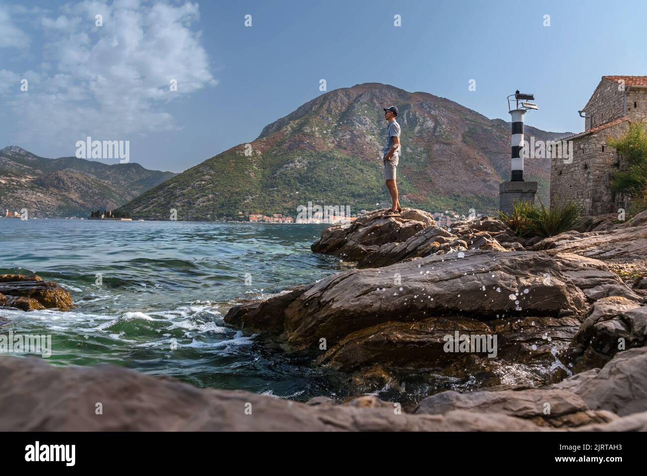 Man Tourists Standing on Cliff near Lighthouse in Montenegro Stock ...