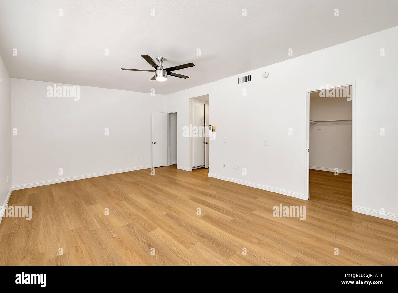 An interior of an empty room with with white walls Stock Photo - Alamy