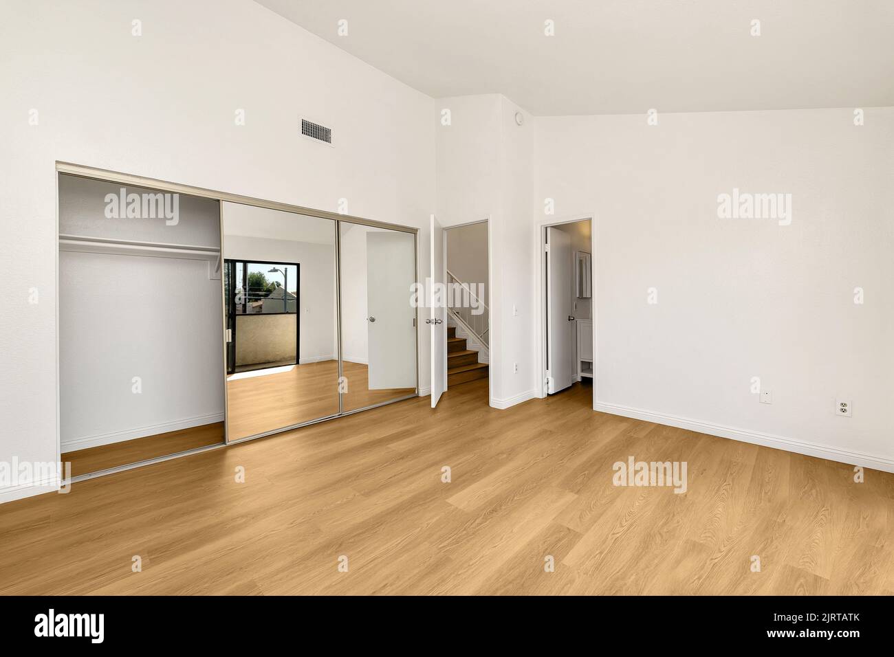 An interior of an empty room with with white walls Stock Photo - Alamy
