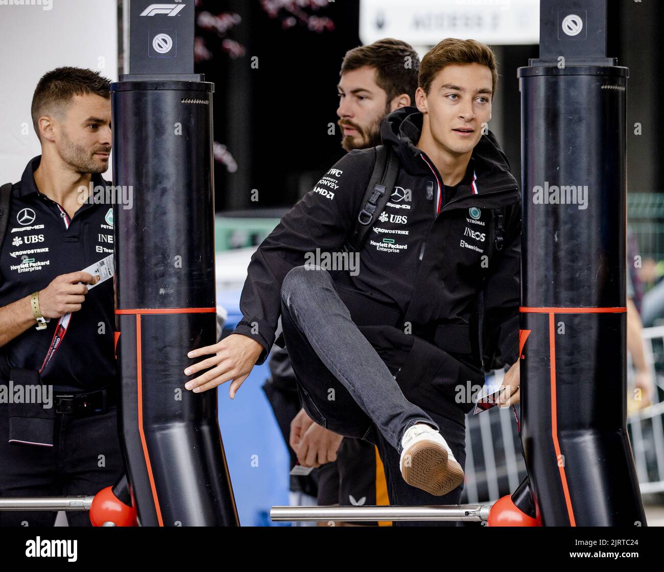 SPA - George Russell (Mercedes) sounds over a fence leading up to the ...