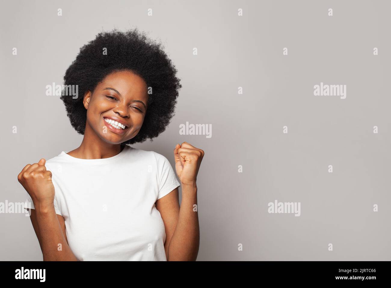 Closeup winning woman face hi-res stock photography and images - Alamy