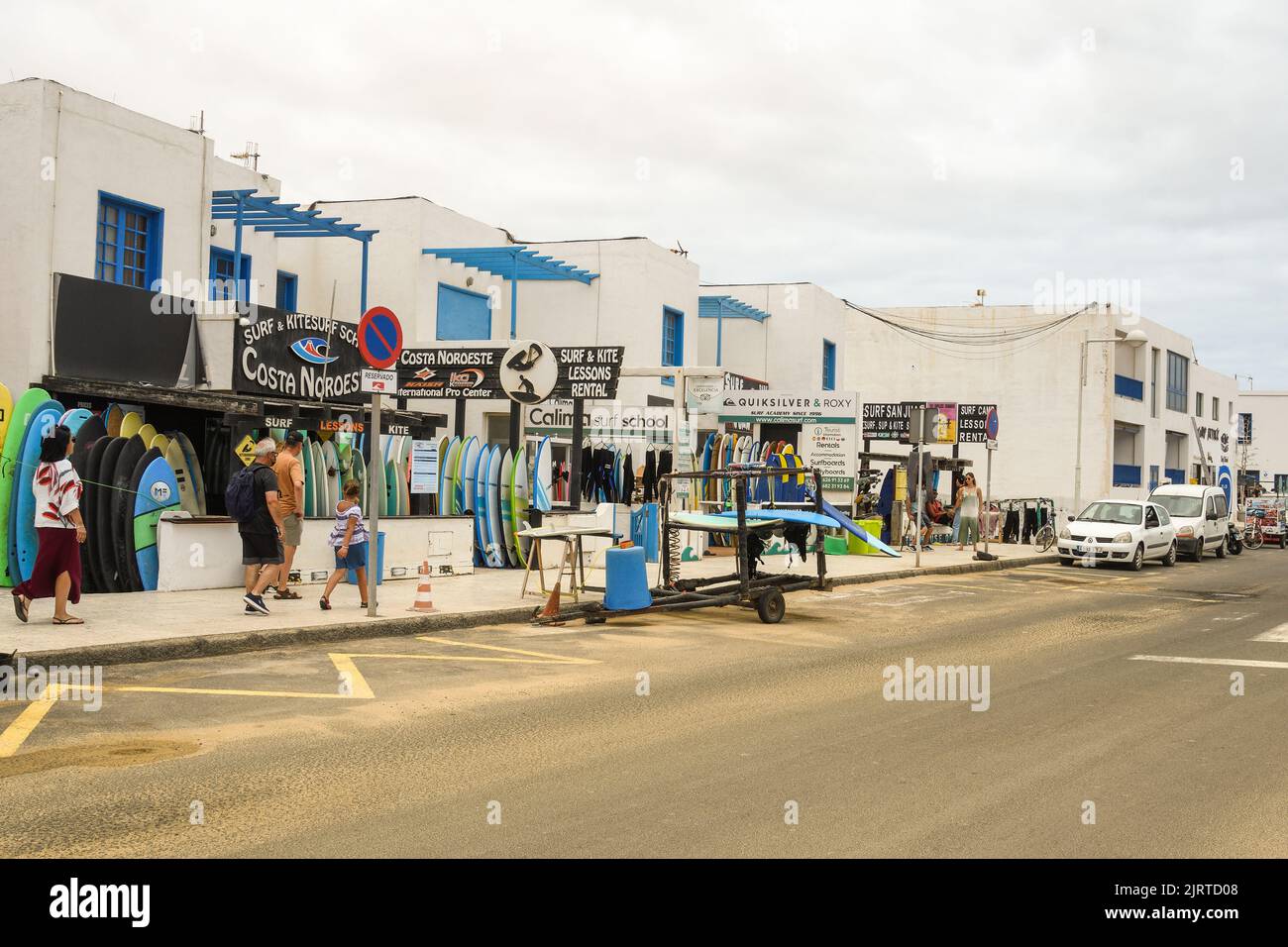 Streets of Caleta de Famara in Lanzarote with surf shops Stock Photo ...