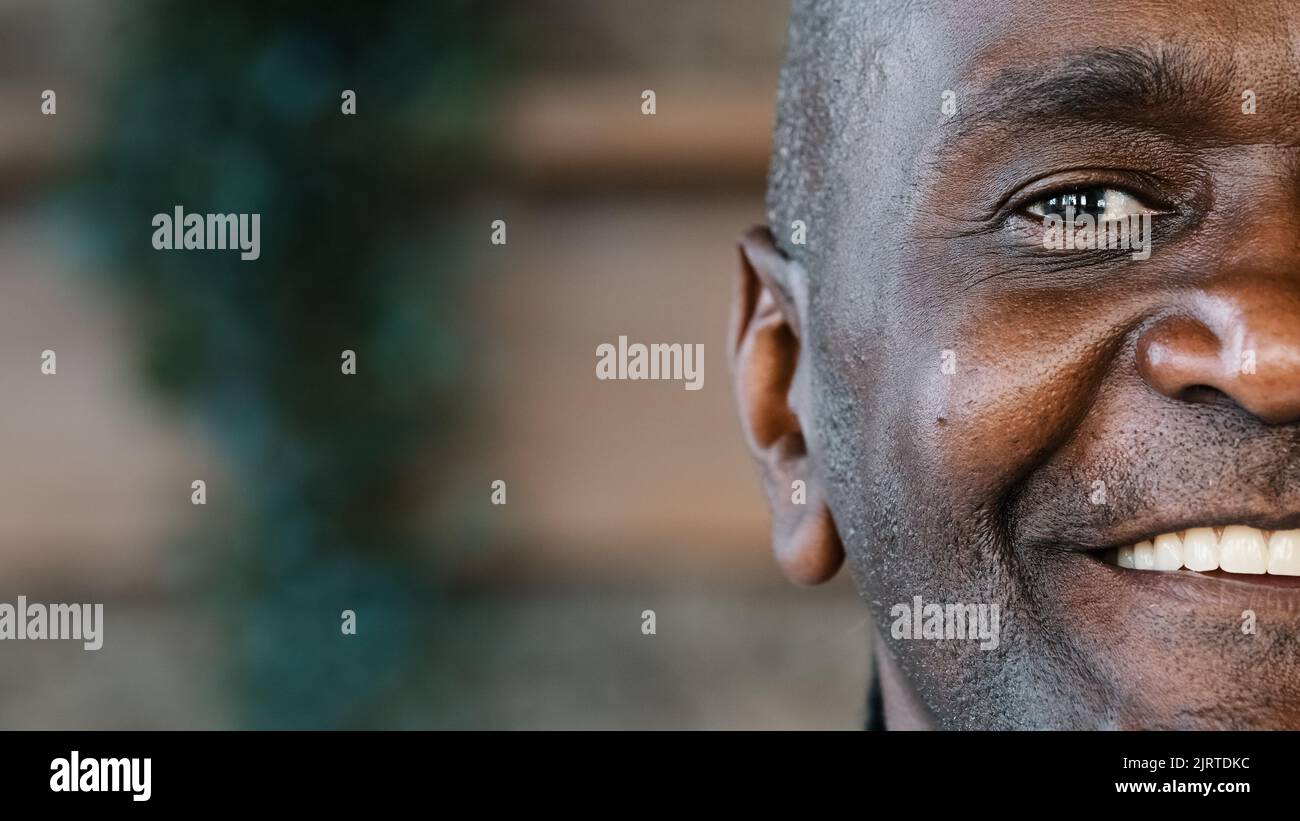 Close up joyful male human unshaved half face in details portrait ...