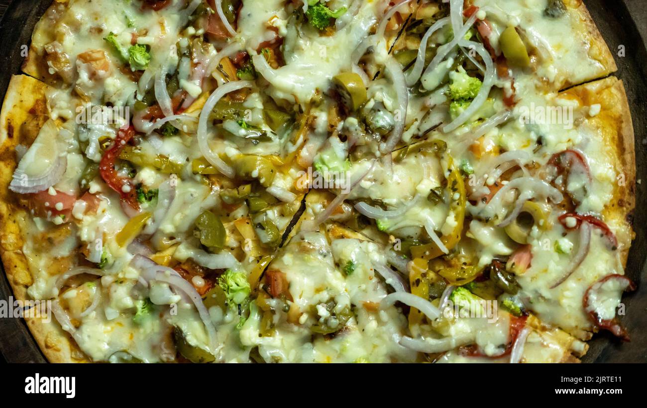 Vegetarian pizza in india. Indian Cheese Veg pizza Stock Photo - Alamy